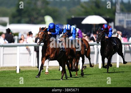 Ombudsman ridden by William Buick (left) on their way to winning the ...