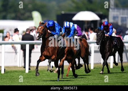 Ombudsman ridden by William Buick (left) on their way to winning the ...
