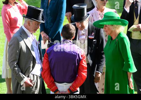John Warren with Queen Camilla and King Charles III watching the Ascot ...