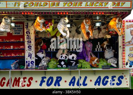 A funfair game stall in Saffron Walden, Essex, offering stuffed animals ...