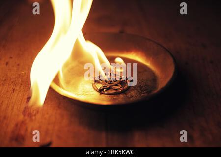 Old pentagram burning in flames close-up photo Stock Photo - Alamy