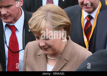 Former German Chancellor Angela Merkel, gestures as she is introduced ...