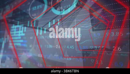 Laptop with financial data charts, glasses, paper clips, and a notebook ...