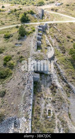 Stone ruins of ancient town of Asseria in Dalmatia, Croatia. Aerial ...