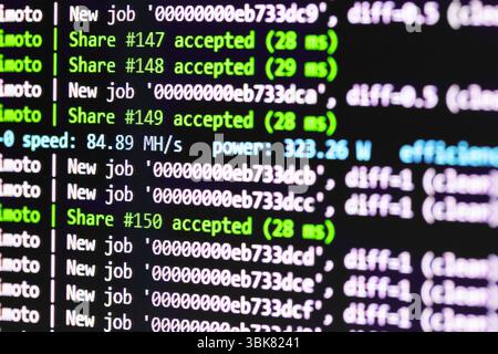 Bitcoin mining program at work close up photo Stock Photo - Alamy
