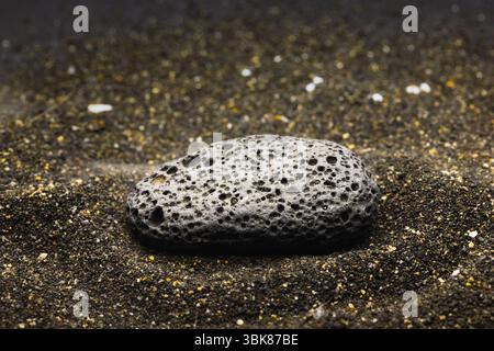 Smoke whirling around small meteorite stone closeup footage Stock Photo ...