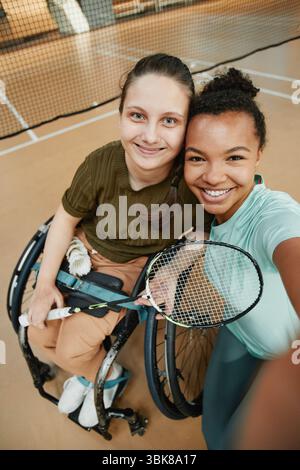 Smiling Female Wheelchair Athlete Training on Track at Stadium Adaptive ...