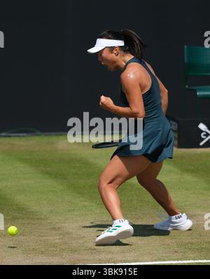 Mingge Xu during her match against Emma Raducanu on day one of the 2025 ...