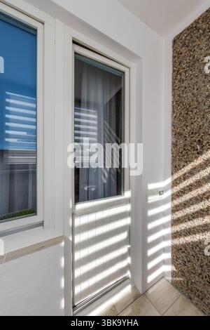 windows and doors on the balcony or loggia Stock Photo - Alamy