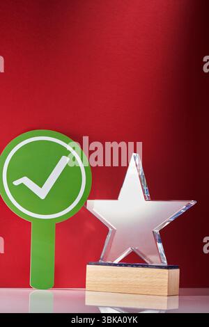 green circle with check mark and crystal trophy Stock Photo - Alamy