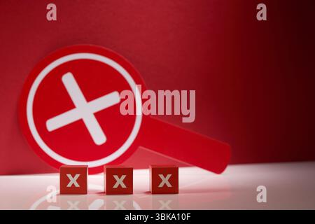 Red round placard with cross sign means rejection. placard with handle ...