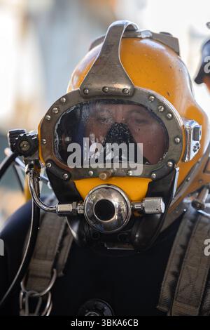 Close up of commercial diver in helmet underwater Stock Photo - Alamy