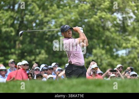 Xander Schauffele watches his tee shot on the 17th hole during the ...