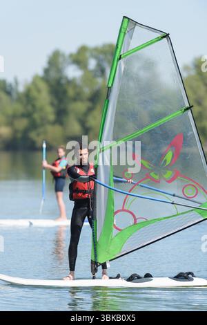 a man during wind surfing practice Stock Photo - Alamy