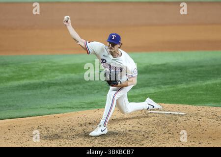 Texas Rangers pitcher Cole Winn throws to the Miami Marlins during the ...