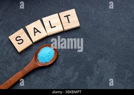 Fine and pure blue salt in a spoon and bowl - Sodium chloride Stock ...