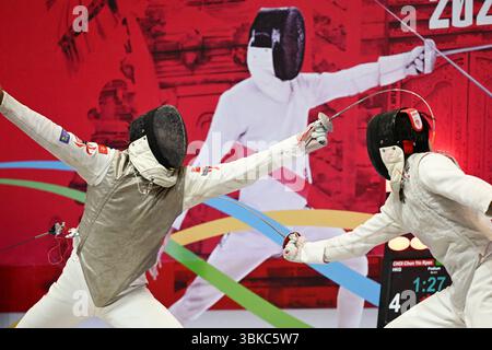 Hong Kong's Ryan Choi Chun Yin (R) fights against Kirill Borodachev of ...
