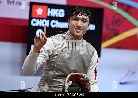 Hong Kong's Ryan Choi Chun Yin (R) fights against Kirill Borodachev of ...
