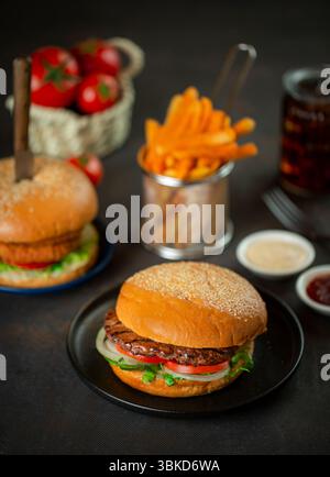 Classic burger with mushroom sauce and French fries Stock Photo - Alamy