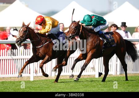 Cercene ridden by Gary Carroll (left) on their way to winning the ...