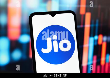 In this photo illustration, the Jio logo is seen displayed on a ...