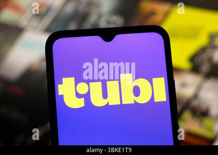 In this photo illustration, the Tubi logo is displayed on a smartphone ...