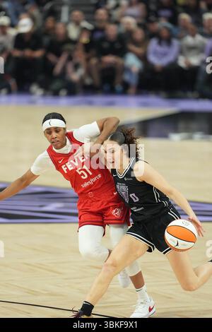 Indiana Fever guard Sydney Colson (51) falls on the court after ...