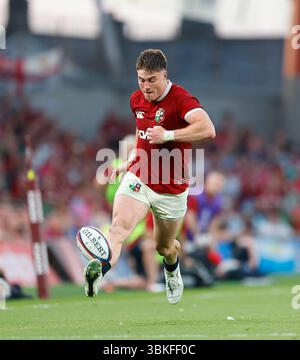 Tommy Freeman of the British & Irish Lions runs at the defence during ...