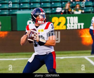 Montreal Alouettes quarterback Davis Alexander (10) takes the snap as ...