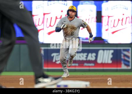 Milwaukee Brewers' Isaac Collins (6) runs to third base on his triple ...