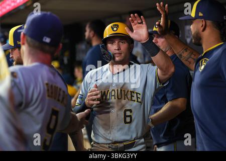 Milwaukee Brewers' Isaac Collins (6) celebrates his three-run home run ...