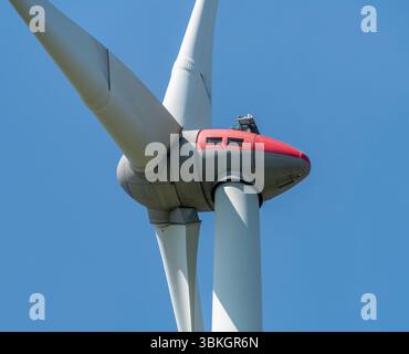 A detail of a wind turbine - nacelle in the left Stock Photo - Alamy
