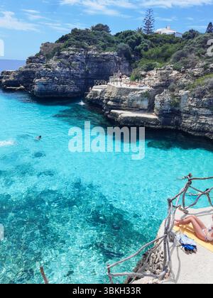 Cala en Brut beach in Menorca. Its main characteristic feature is the ...