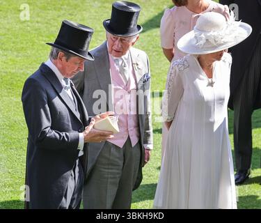 John Warren with Queen Camilla and King Charles III watching the Ascot ...