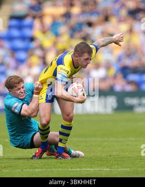 Zac Woolford is tackled during the BetFred Super League match between ...