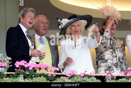 John Warren with Queen Camilla and King Charles III watching the Ascot ...