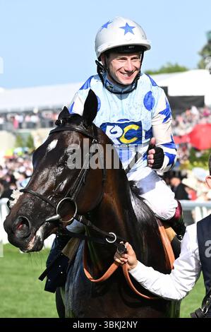 Jockey Oisin Murphy celebrates winning the Coventry Stakes on Berkshire ...