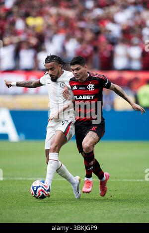 Malo Gusto of Chelsea FC competes for the ball with Khalil Guenichi of ...