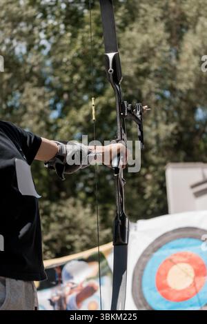 Archers shoot during the archery competition at the Mongolian summer ...