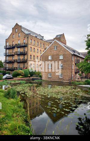 Coxes lock mill buildings by Coxes lock on the River Wey Navigation ...