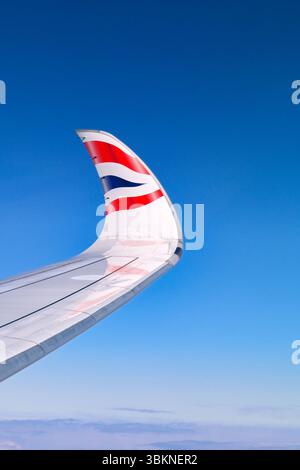 En route London to Denver, USA - 20 May 2025: Curved tip of a wing on a ...