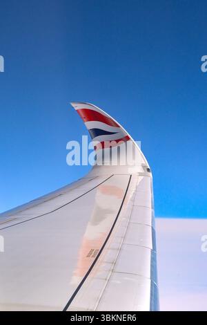 En route London to Denver, USA - 20 May 2025: Curved tip of a wing on a ...