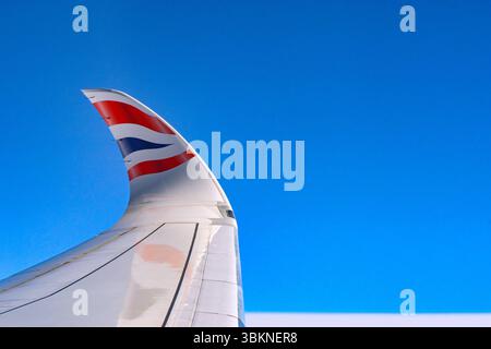 En route London to Denver, USA - 20 May 2025: Curved tip of a wing on a ...