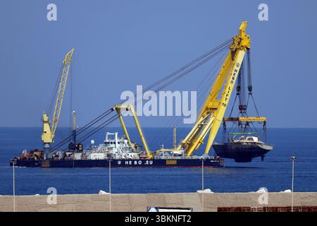 THE BAYESIAN LEAVES PORTICELLO WITH THE HEBO LIFT 10 BARGE AND IS TAKEN ...