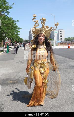 People dressed as mermaids and othet sea creatures pose for photos ...