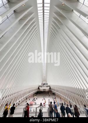 Exterior view and lobby of the Oculus Building and the Freedom Tower in ...
