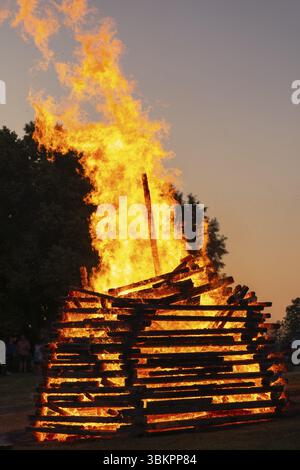 Magical summer night at the midsummer bonfire in Germany, Swabian Alb ...