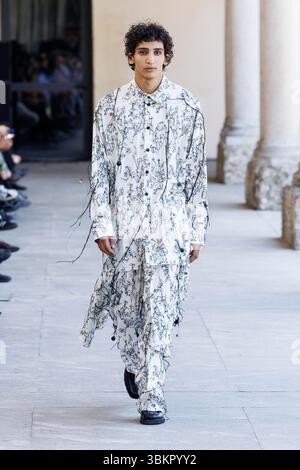 Milan, Italy. 22nd June, 2025. Lyas poses for photographers at Prada ...