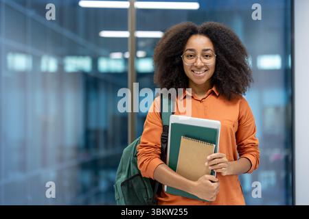 Beautiful African-American student with bright purple eyelids Stock ...