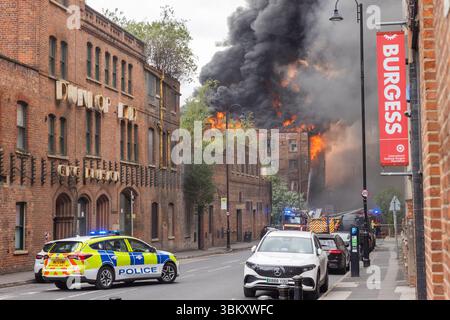 Manchester, UK. 23 JUN, 2025. Large fire engulfs the abandoned Hotspur ...